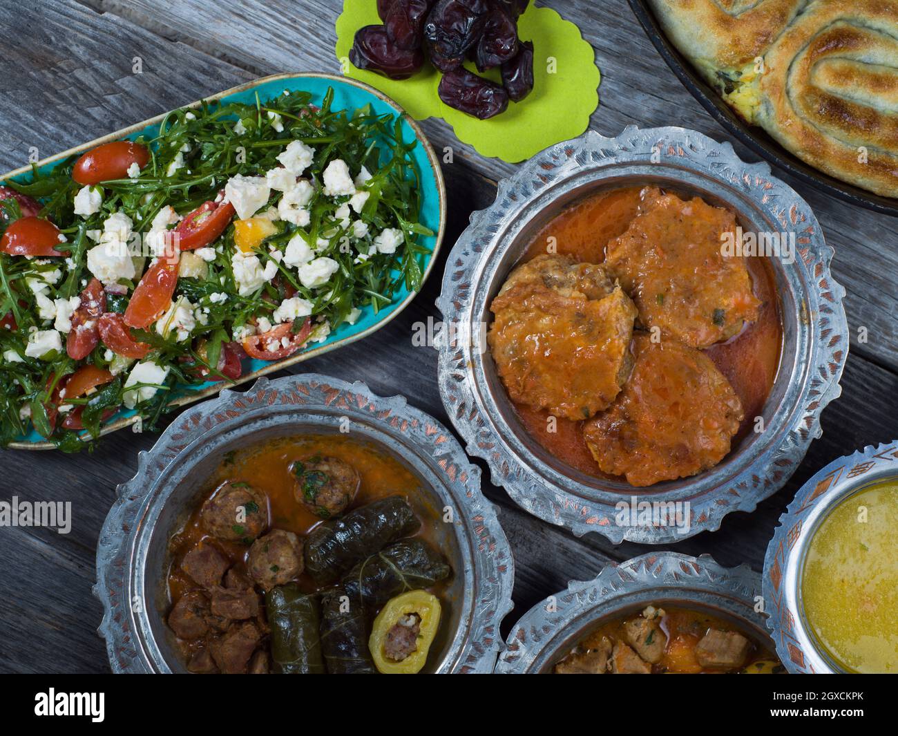 Eid Mubarak Traditional Ramadan Iftar dinner. Assorted tasty food in ...