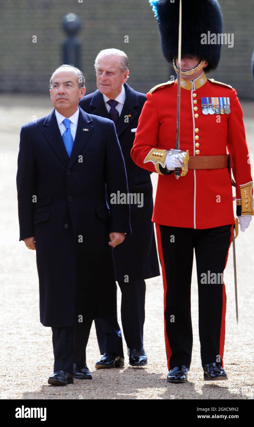 President Felipe Calderon of Mexico, accompanied by Prince Philip, Duke ...