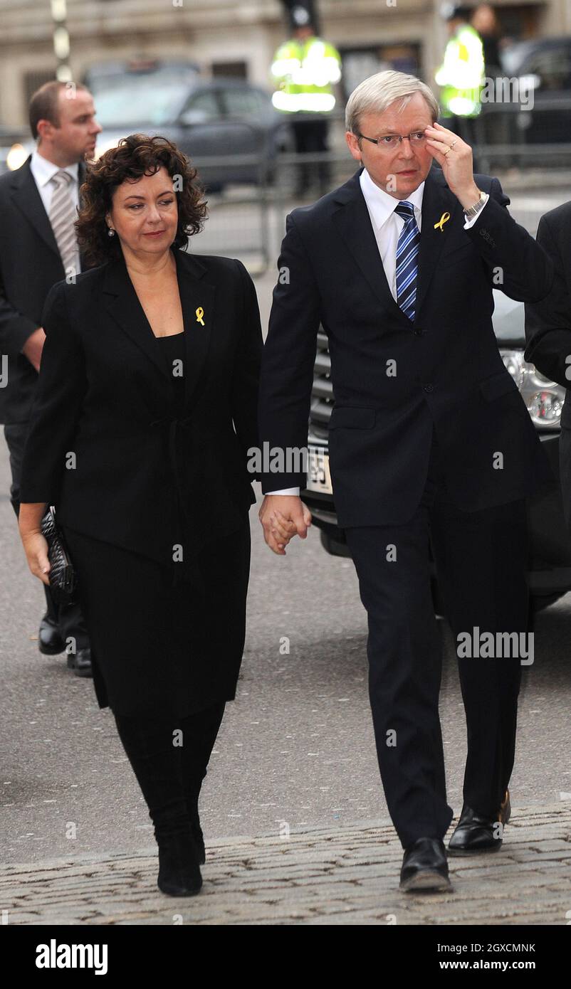 Australian Prime Minister Kevin Rudd and Therese Rein (L) arrive for a ...