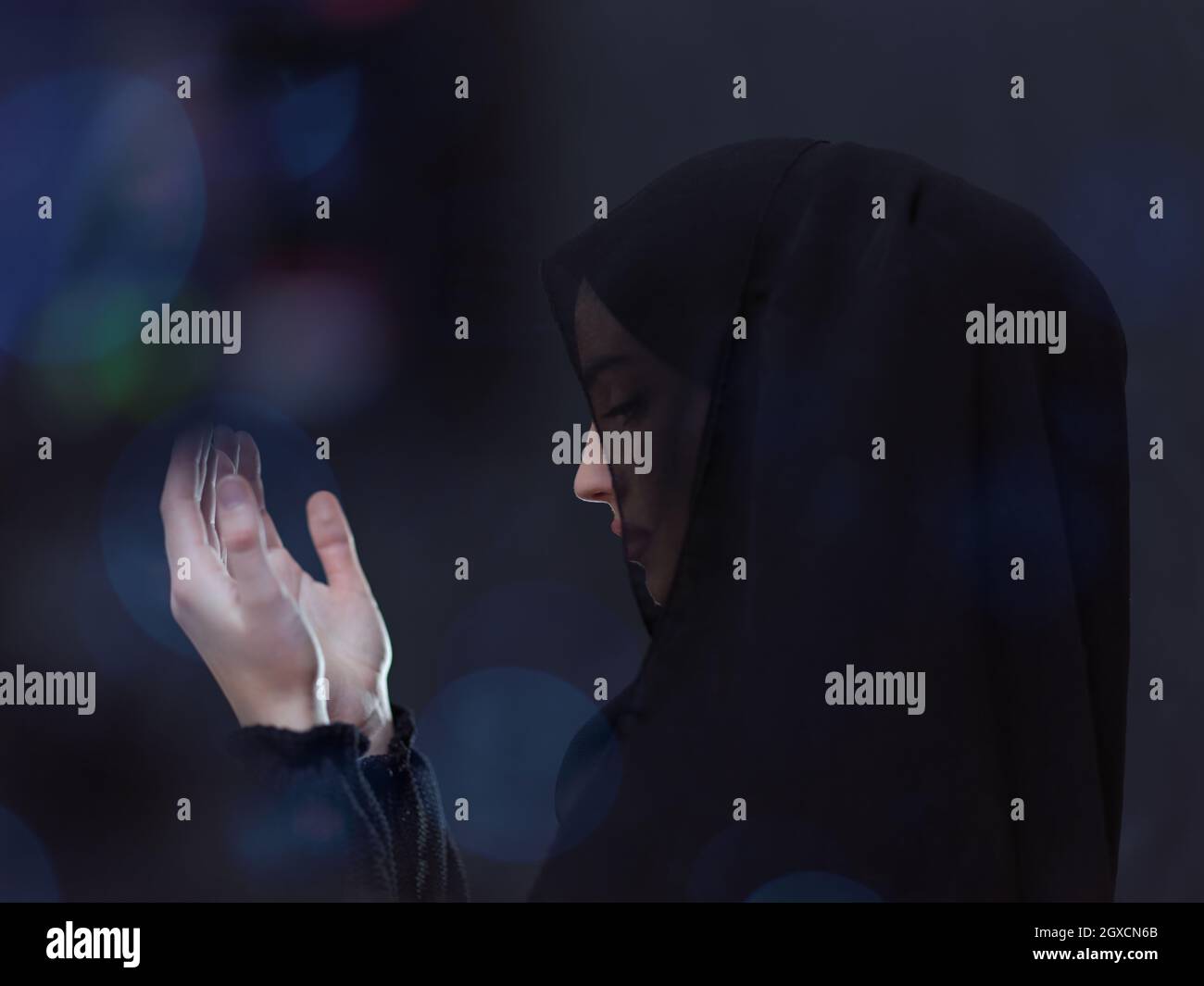 Muslim woman making traditional prayer hi-res stock photography and ...