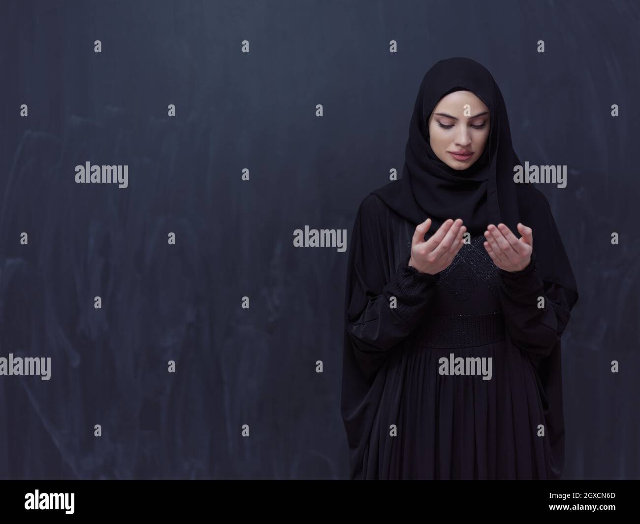 Muslim woman making traditional prayer hi-res stock photography and ...