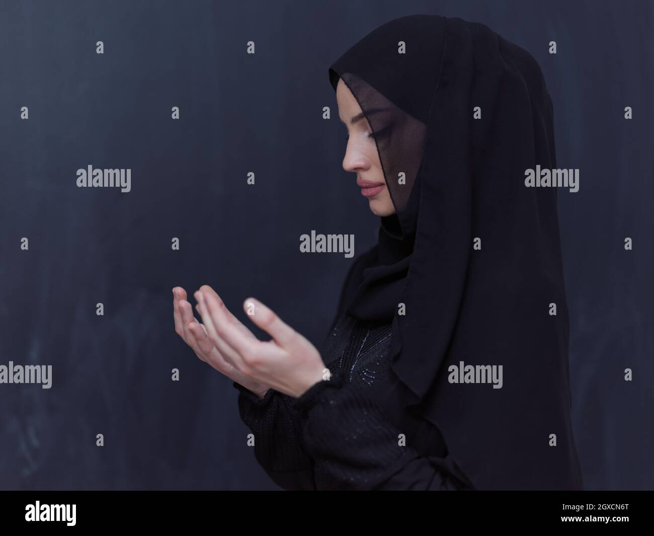 Muslim woman making traditional prayer hi-res stock photography and ...