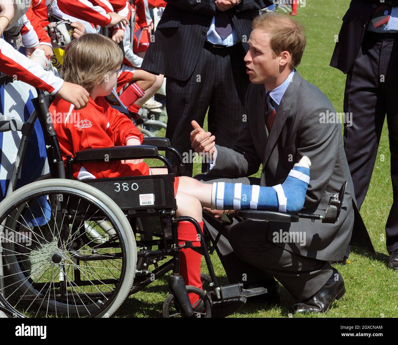 Prince William, President of the Football Association, talks to injured ...