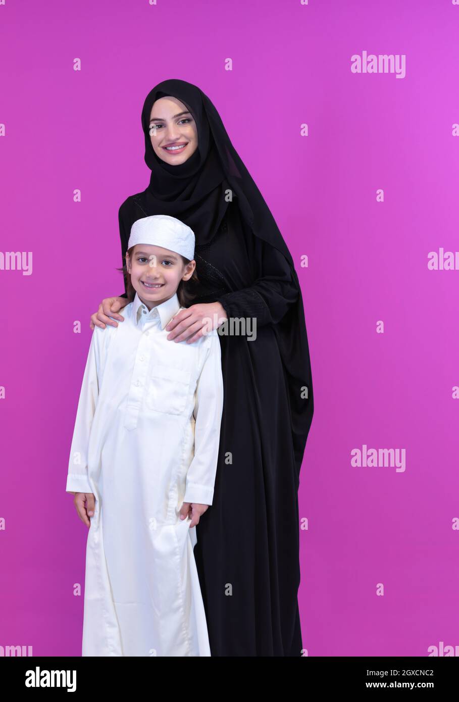 portrait of happy arabian family muslim mother and son wearing ...