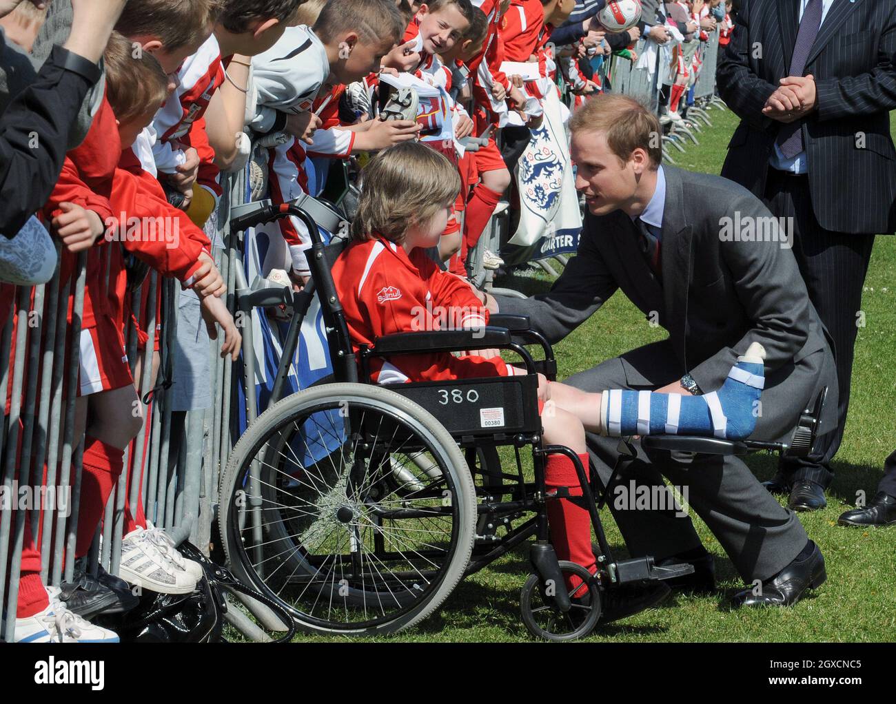 Prince William, President of the Football Association talks to injured ...