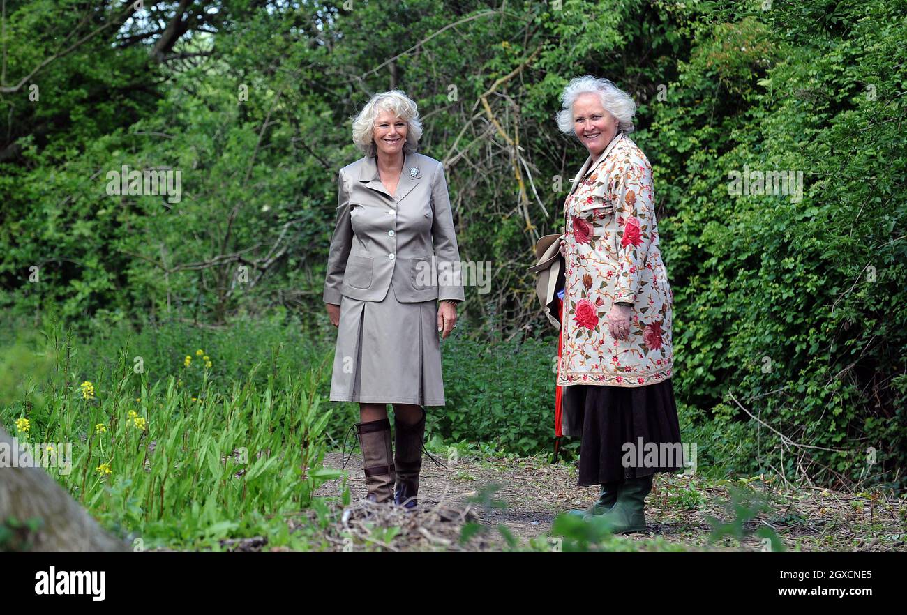 The Duchess of Cornwall, accompanied by aide Amanda Macmanus, walks ...