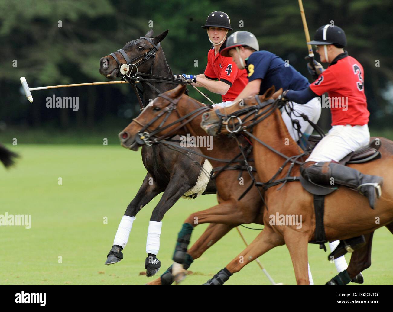 Prince William takes part in a charity polo match at Cirencester Park ...
