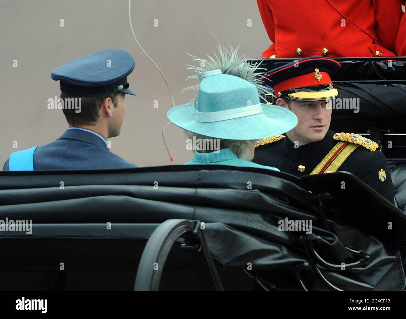 Prince Harry rides a carriage with Prince William and Camilla, Duchess ...
