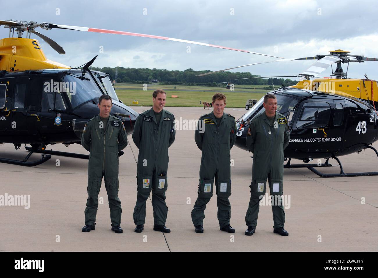 Prince William and Prince Harry pose with their instructors Craig Finch ...