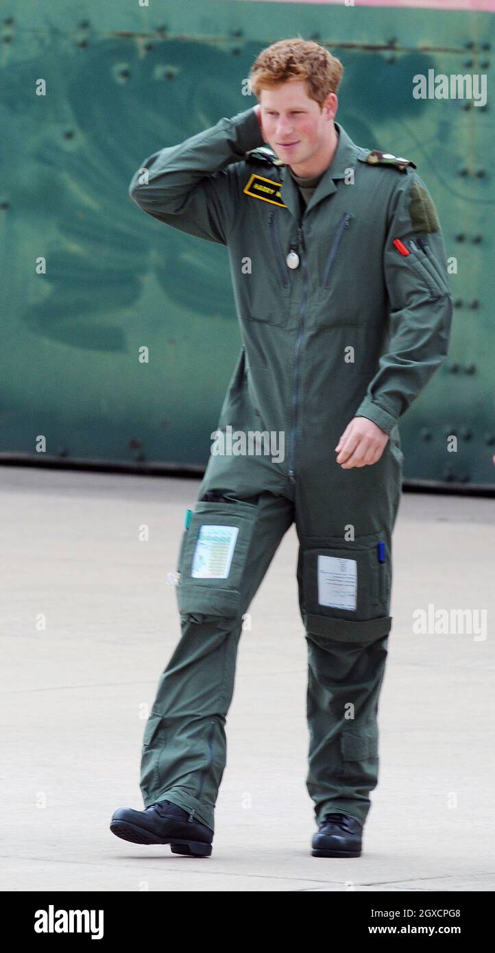 Prince Harry attends a photocall during his military helicopter ...