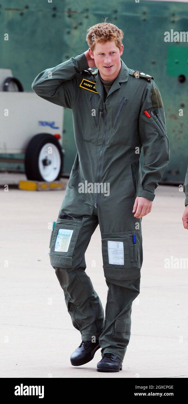 Prince Harry attends a photocall during his military helicopter ...