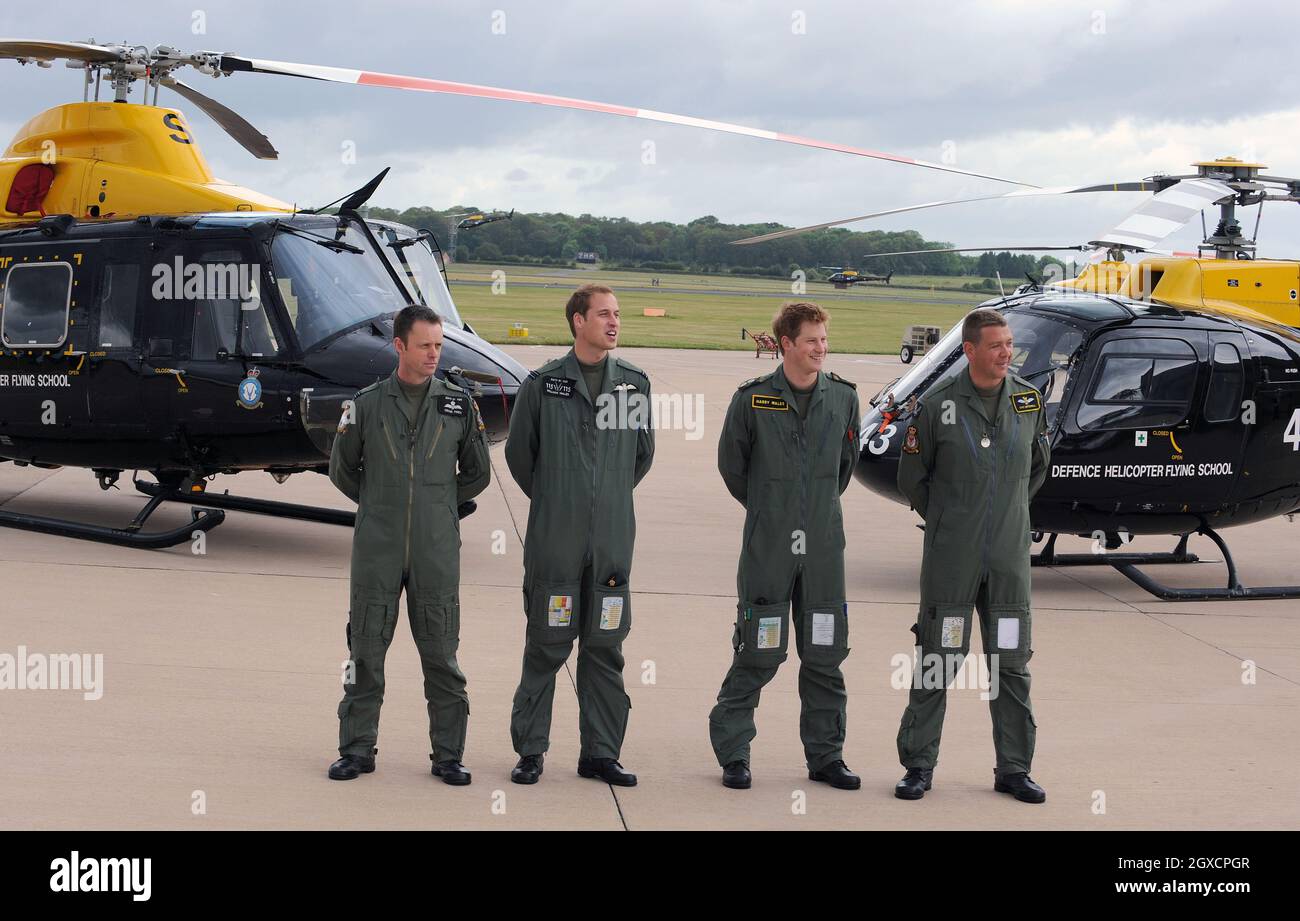 Prince William and Prince Harry pose with their instructors Craig Finch ...