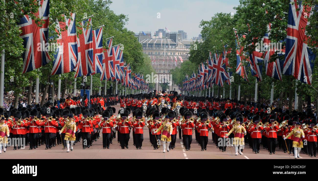 Soldiers march up the Mall following the Trooping the Colour Ceremony ...