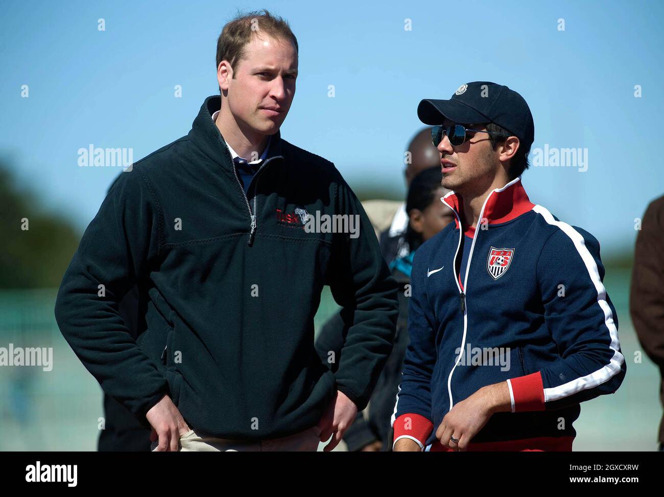 Prince William chats to US singing sensation Joe Jonas as the pair show ...