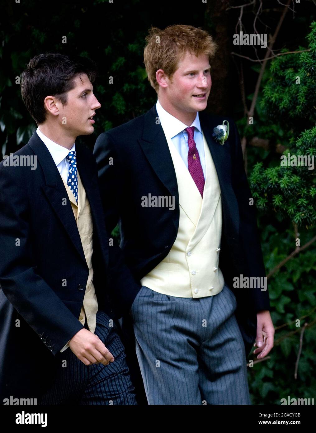Prince Harry (R) attends the wedding of his former Equerry Mark Dyer to ...