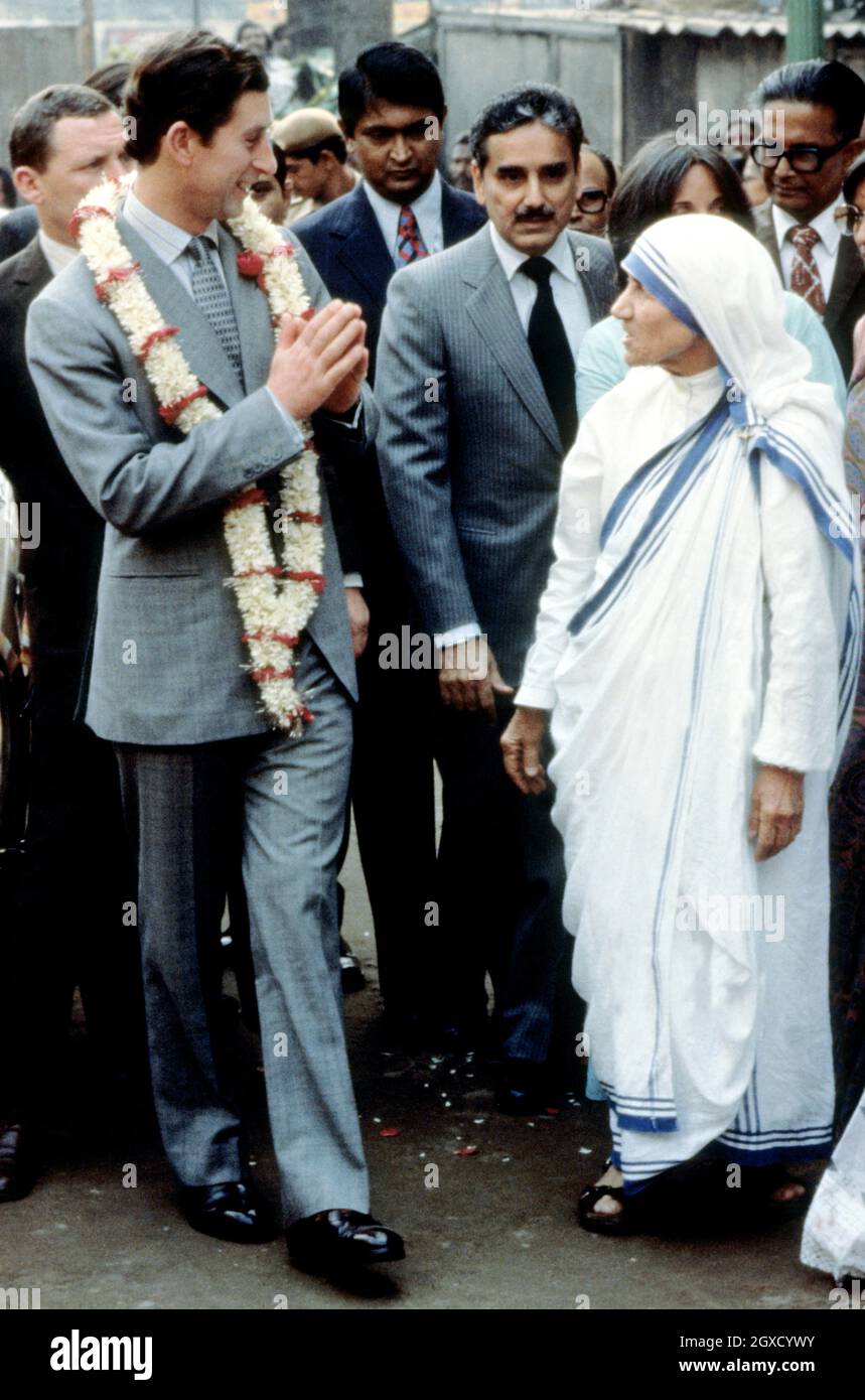Prince Charles, Prince of Wales, wearing a garland, visits Mother ...
