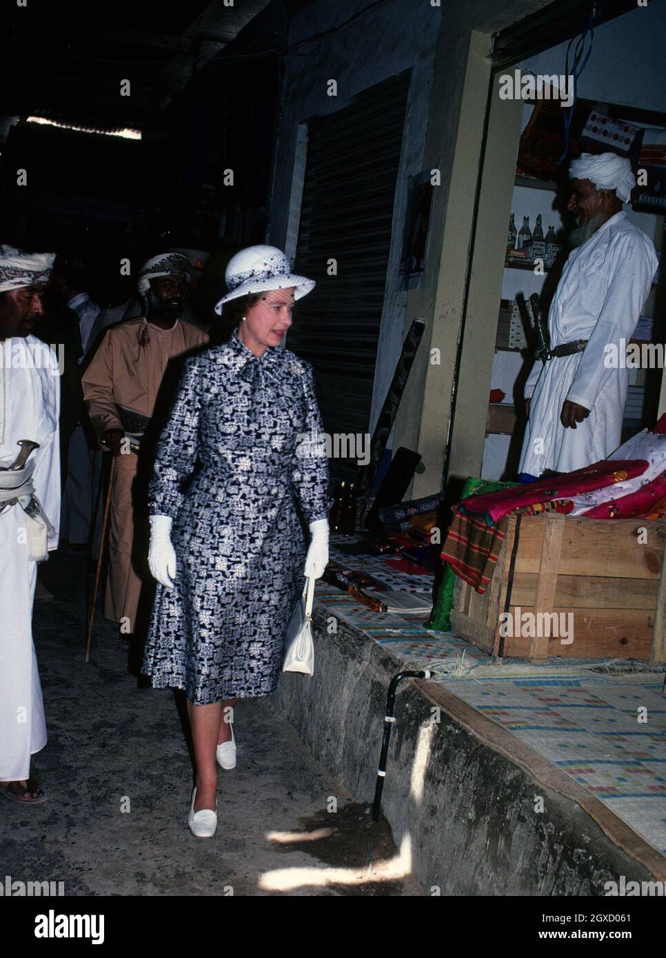 Queen Elizabeth ll looks around a souk in Muscat during a State Visit ...