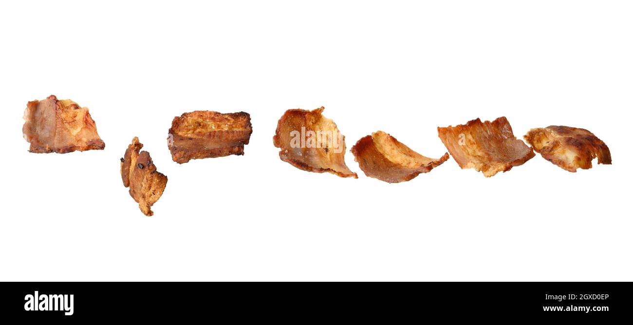 various small fried bacon pieces isolated on white background Stock ...