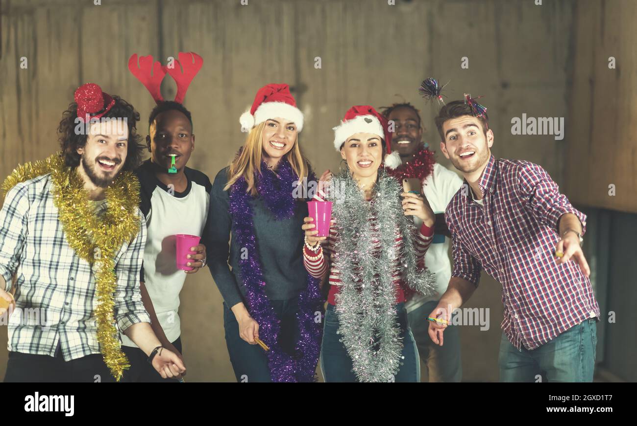 multiethnic group of young happy casual business people dancing with ...