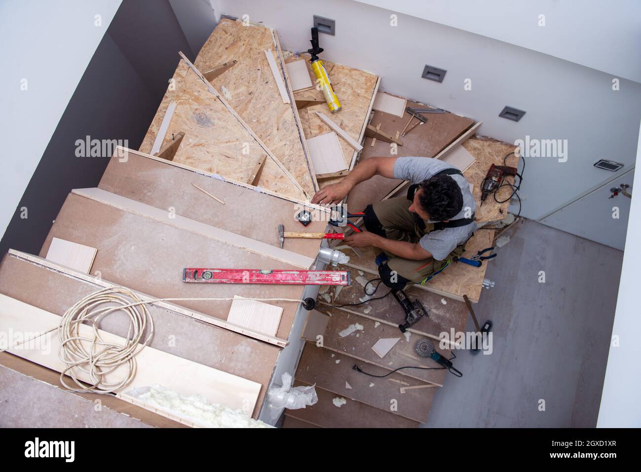 work in progress on stylish interior professional carpenter installing ...