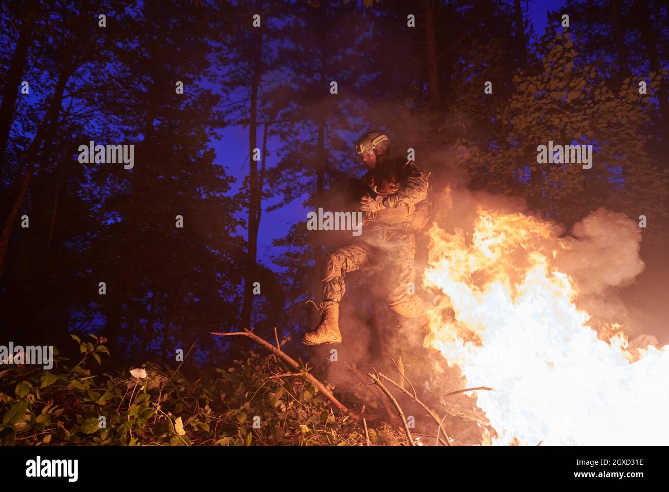 Soldier in Action at Night in the Forest Area. Night Time Military ...