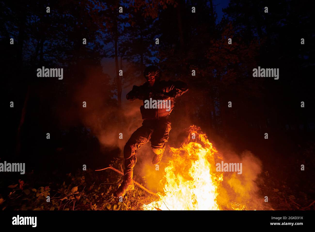 Soldier in Action at Night in the Forest Area. Night Time Military ...