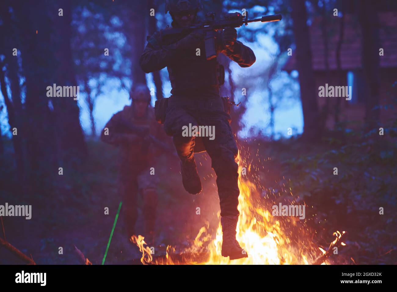 Soldier in Action at Night in the Forest Area. Night Time Military ...
