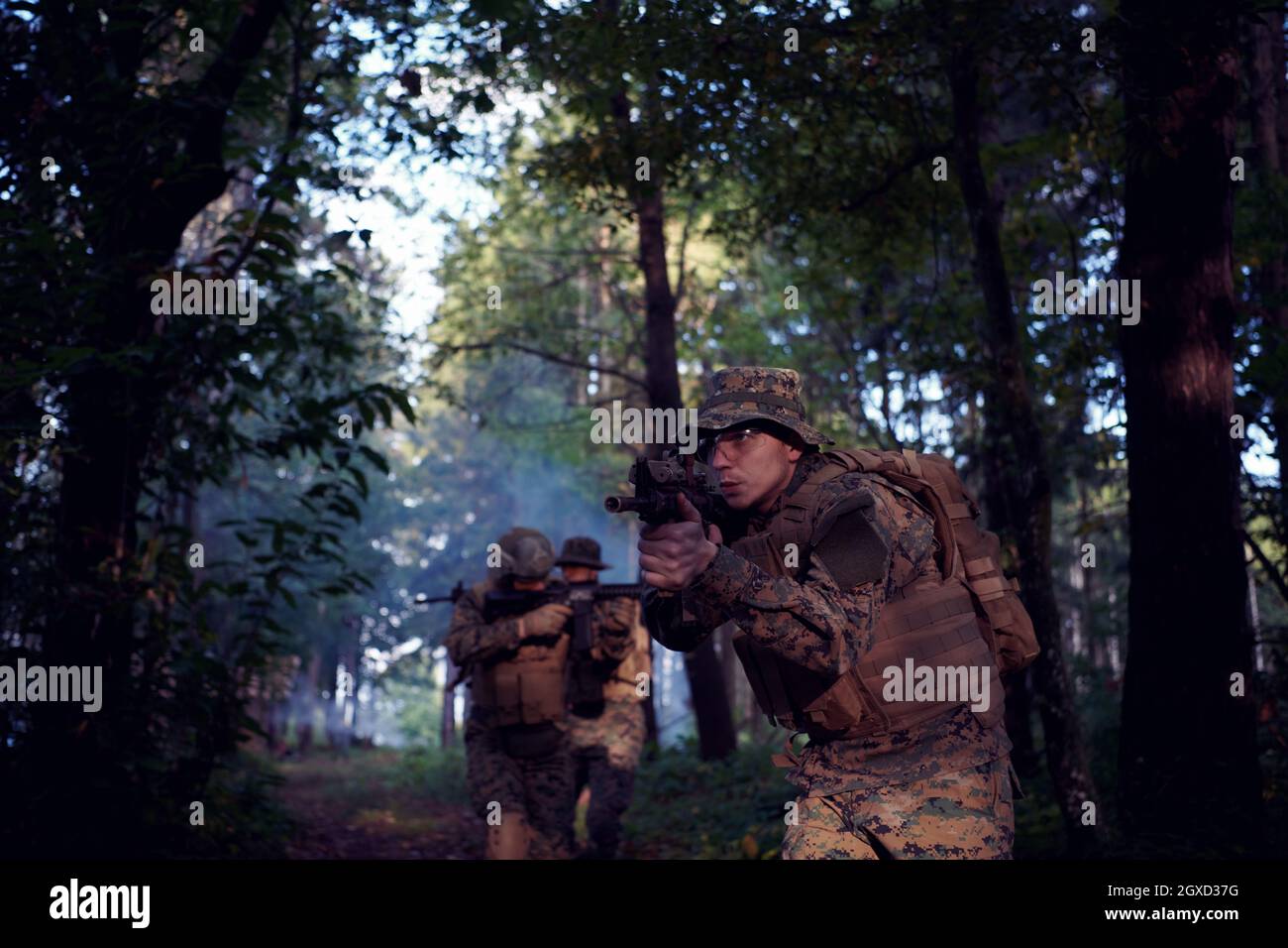 Modern warfare Soldiers Squad Running as Team in Battle Formation Stock ...
