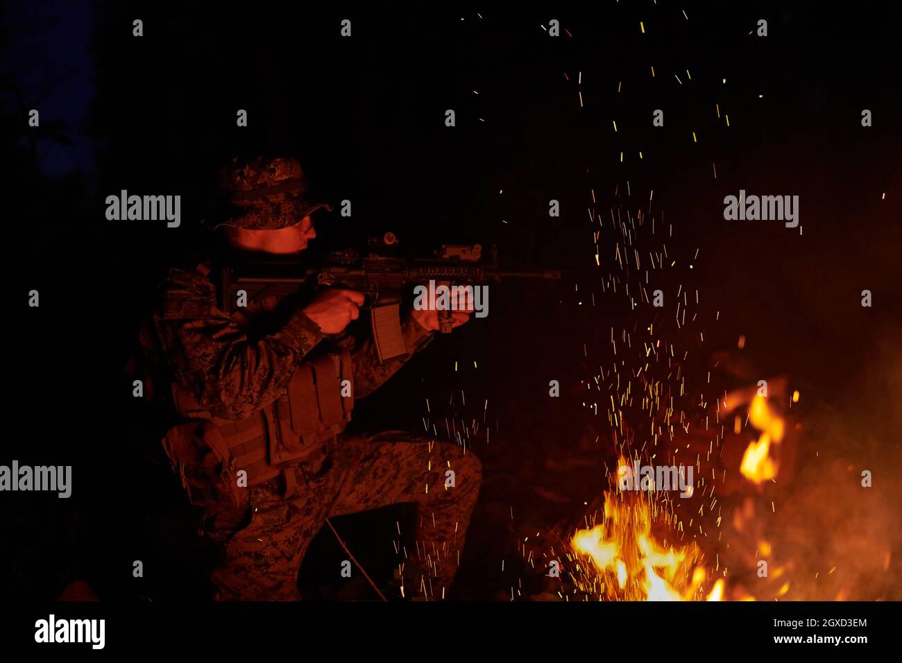 soldiers squad in action on night mission using laser sight beam lights ...