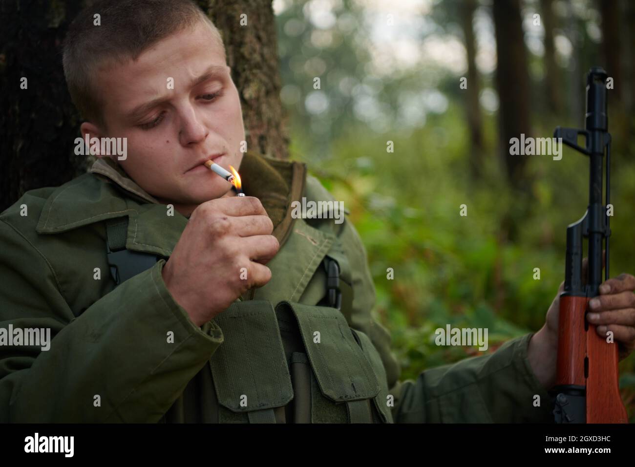 Holding Gun Cigarette High Resolution Stock Photography and Images - Alamy
