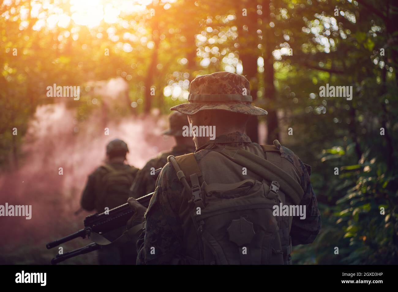 Modern warfare Soldiers Squad Running as Team in Battle Formation Stock ...