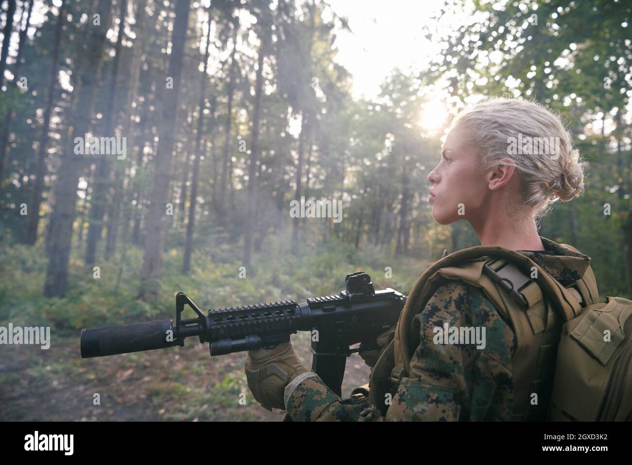woman soldier ready for battle wearing protective military gear and ...