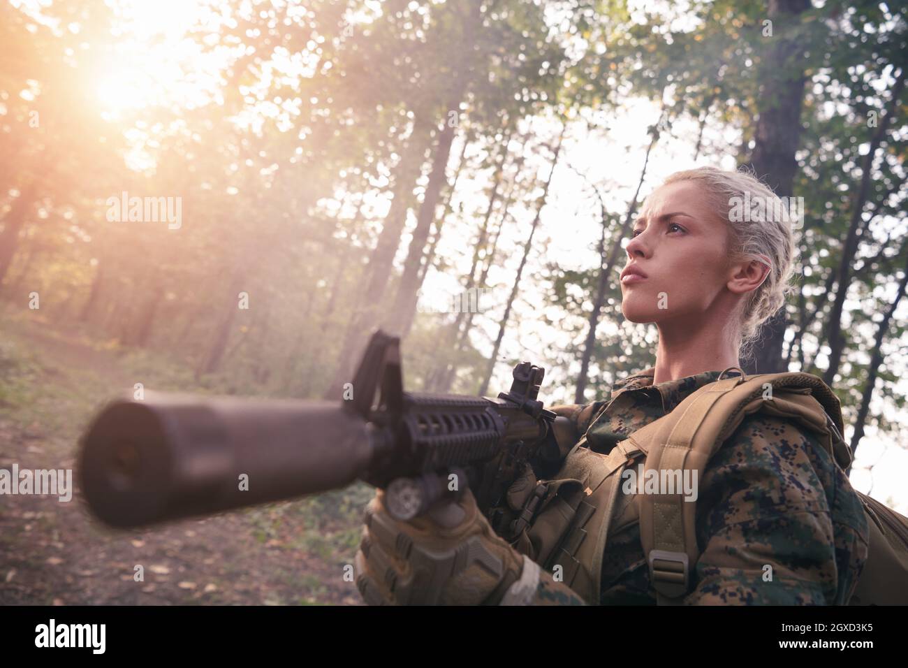 woman soldier ready for battle wearing protective military gear and ...