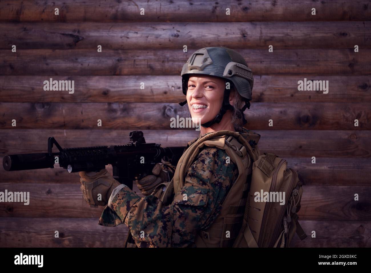 woman soldier ready for battle wearing protective military gear and ...