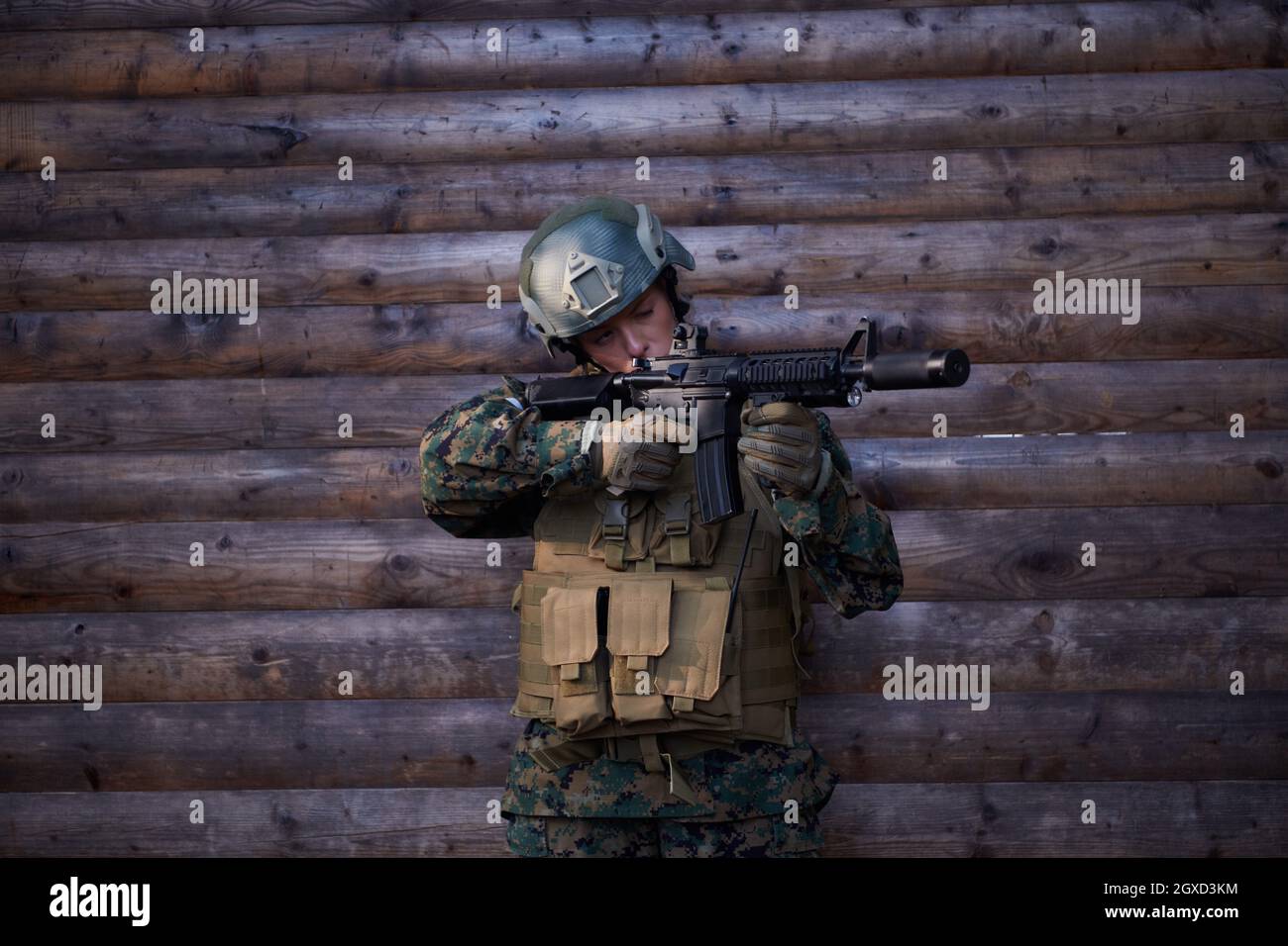 woman soldier ready for battle wearing protective military gear and ...