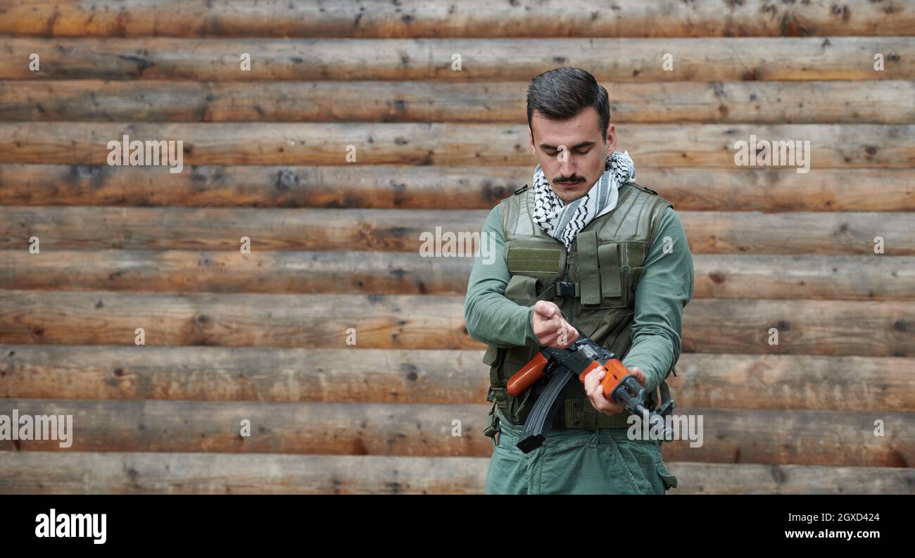 angry terrorist militant guerrilla soldier warrior in forest Stock ...