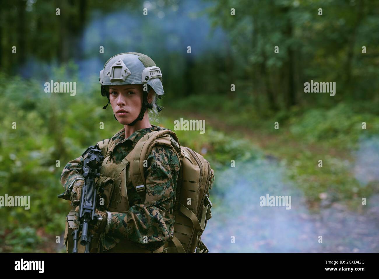 woman soldier ready for battle wearing protective military gear and ...