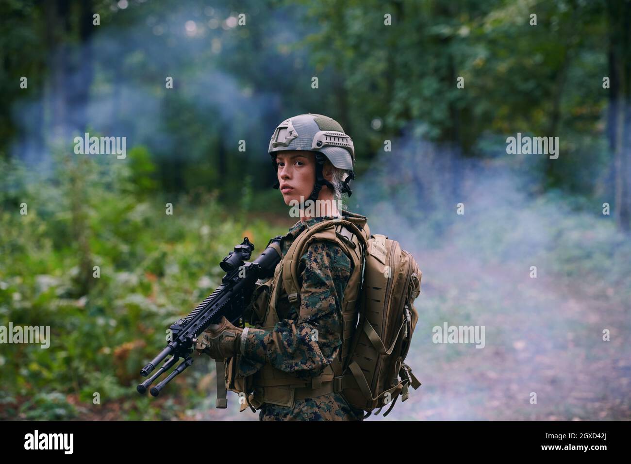 woman soldier ready for battle wearing protective military gear and ...