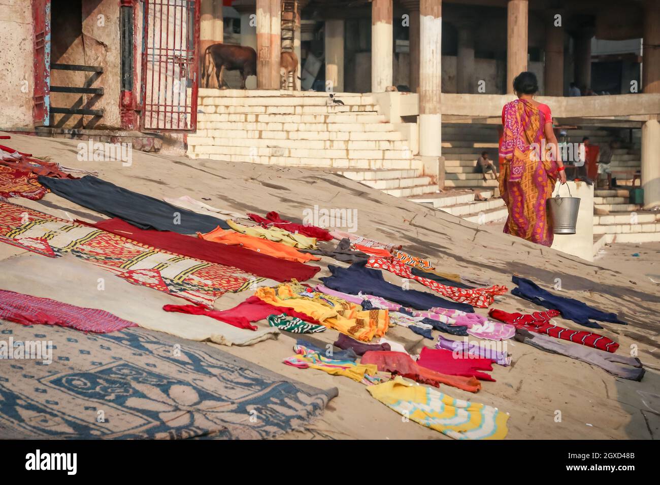 INDIA, VARANASI - NOVEMBER 27, 2015: Back view of unrecognizable ethnic ...