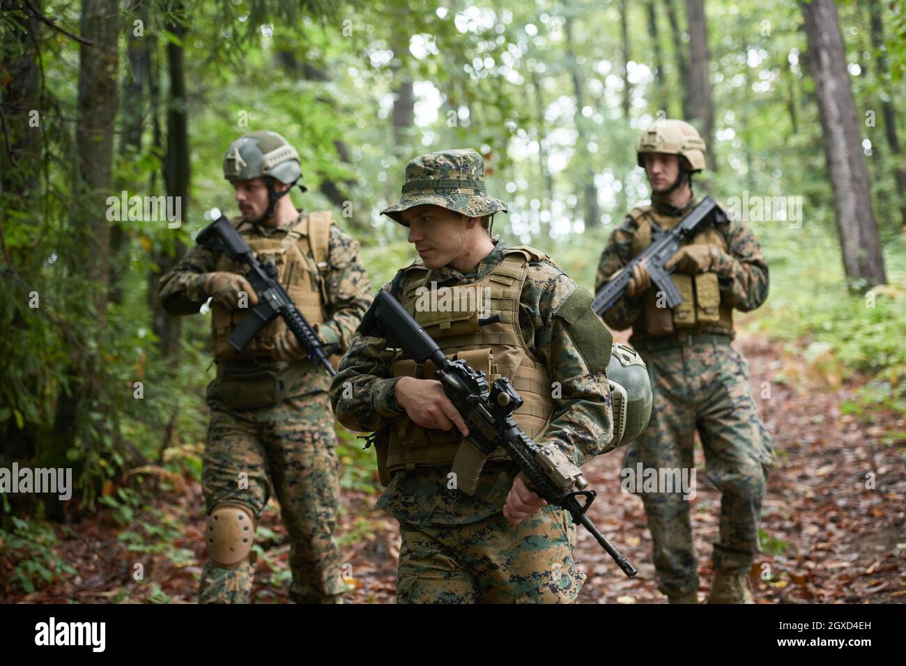 soldiers squad relaxed walking after battle Stock Photo - Alamy