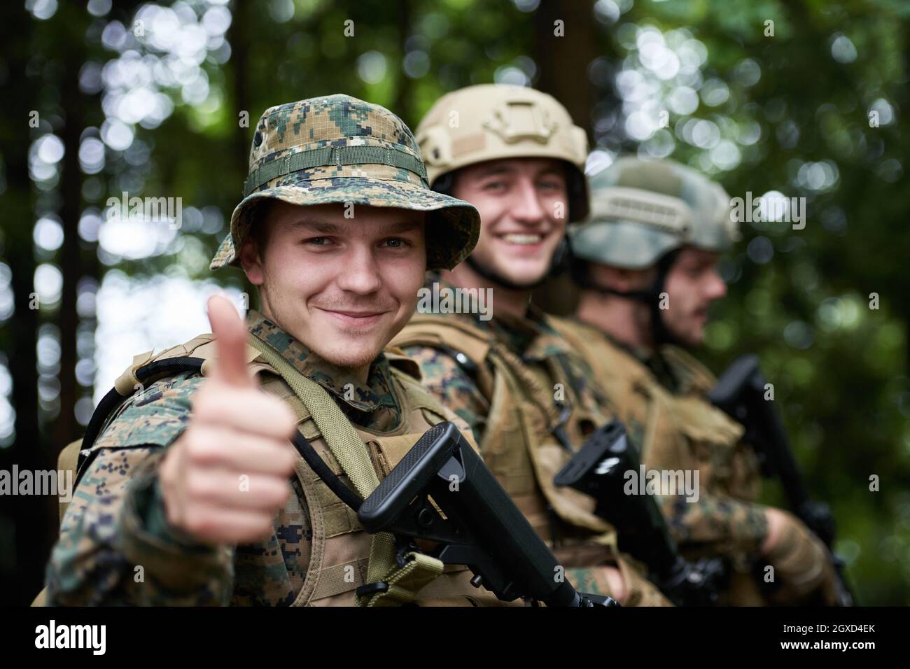 soldiers squad relaxed walking after battle Stock Photo - Alamy