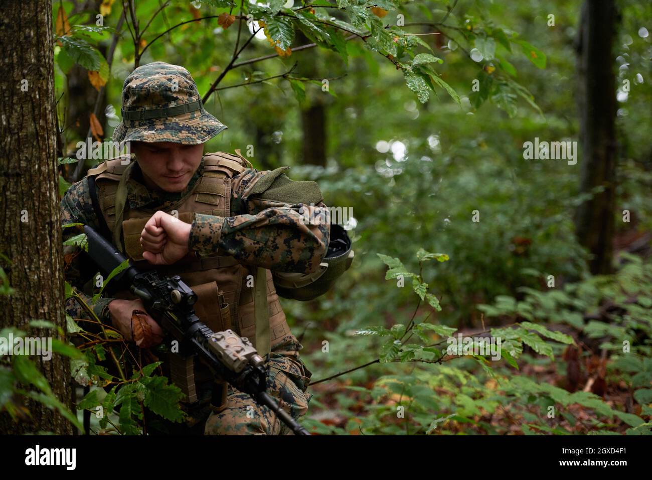 american marine corps special operations soldier preparing tactical and ...