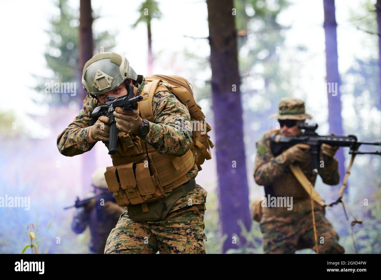 Modern warfare Soldiers Squad Running as Team in Battle Formation Stock ...