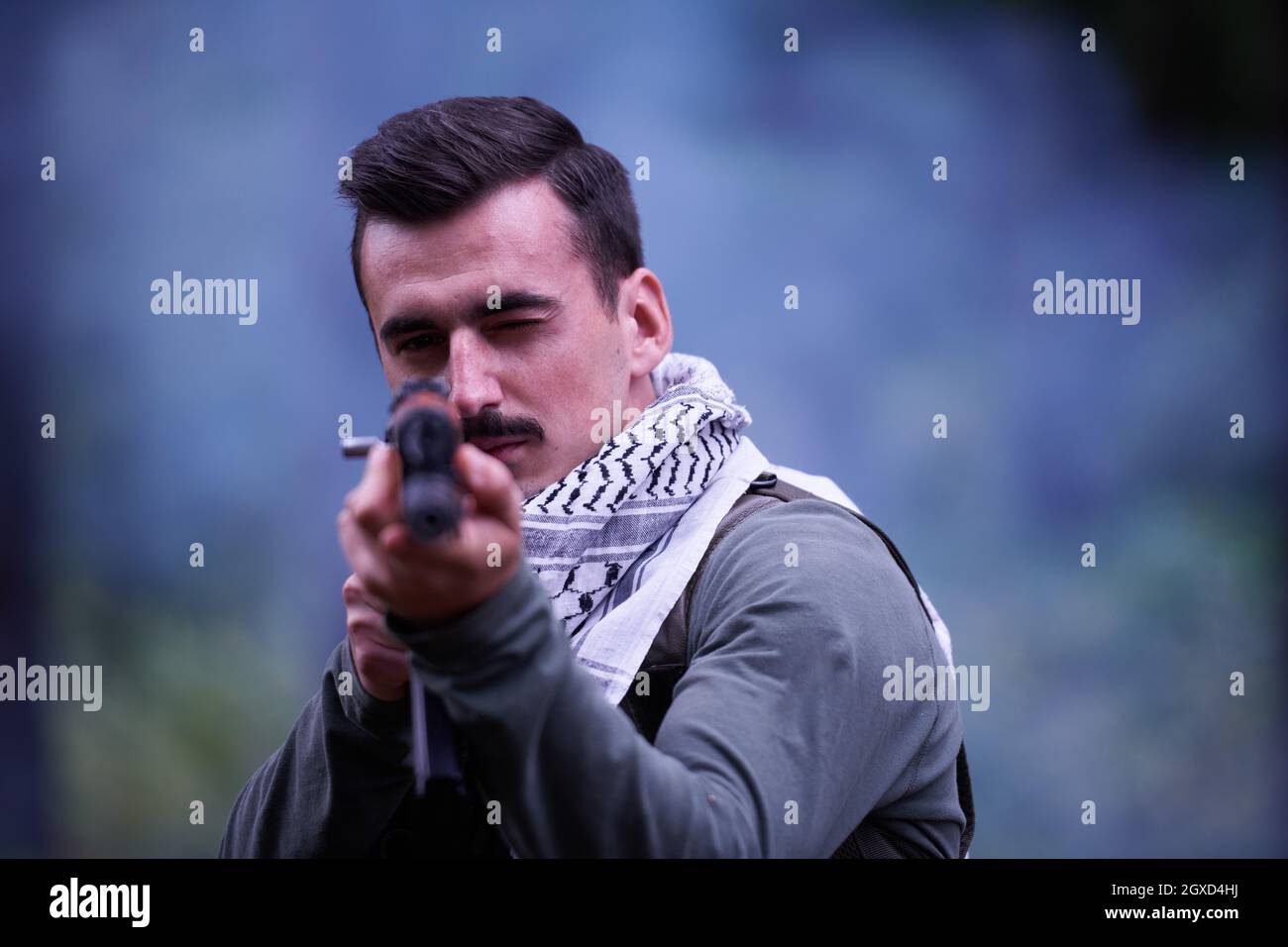 angry terrorist militant guerrilla soldier warrior in forest Stock ...