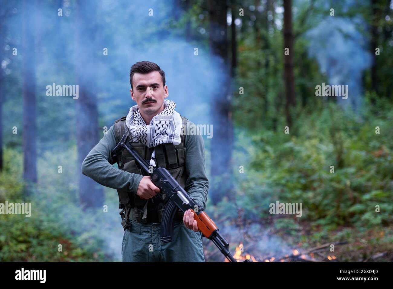 angry terrorist militant guerrilla soldier warrior in forest Stock ...
