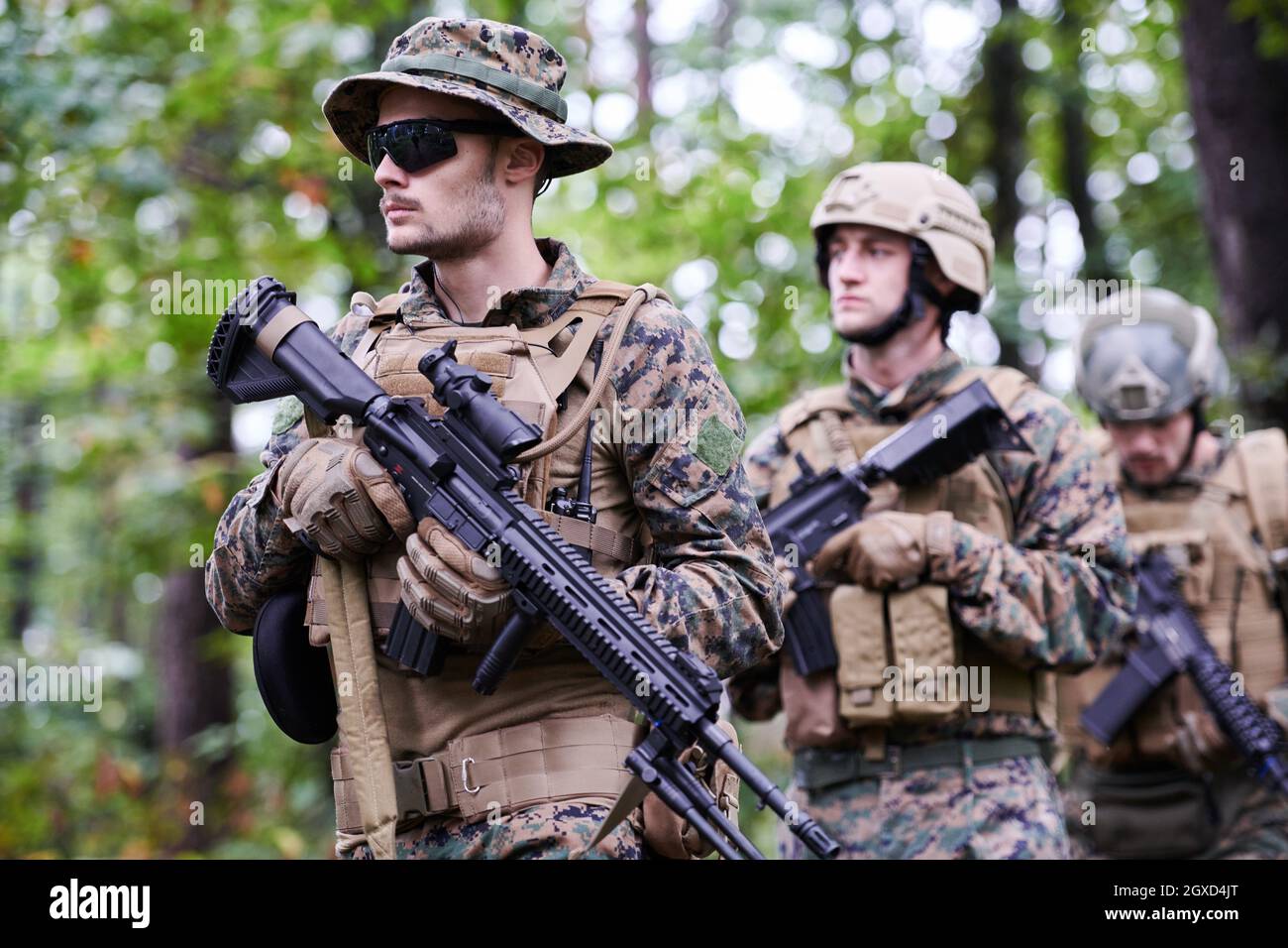 soldiers squad relaxed walking after battle Stock Photo - Alamy