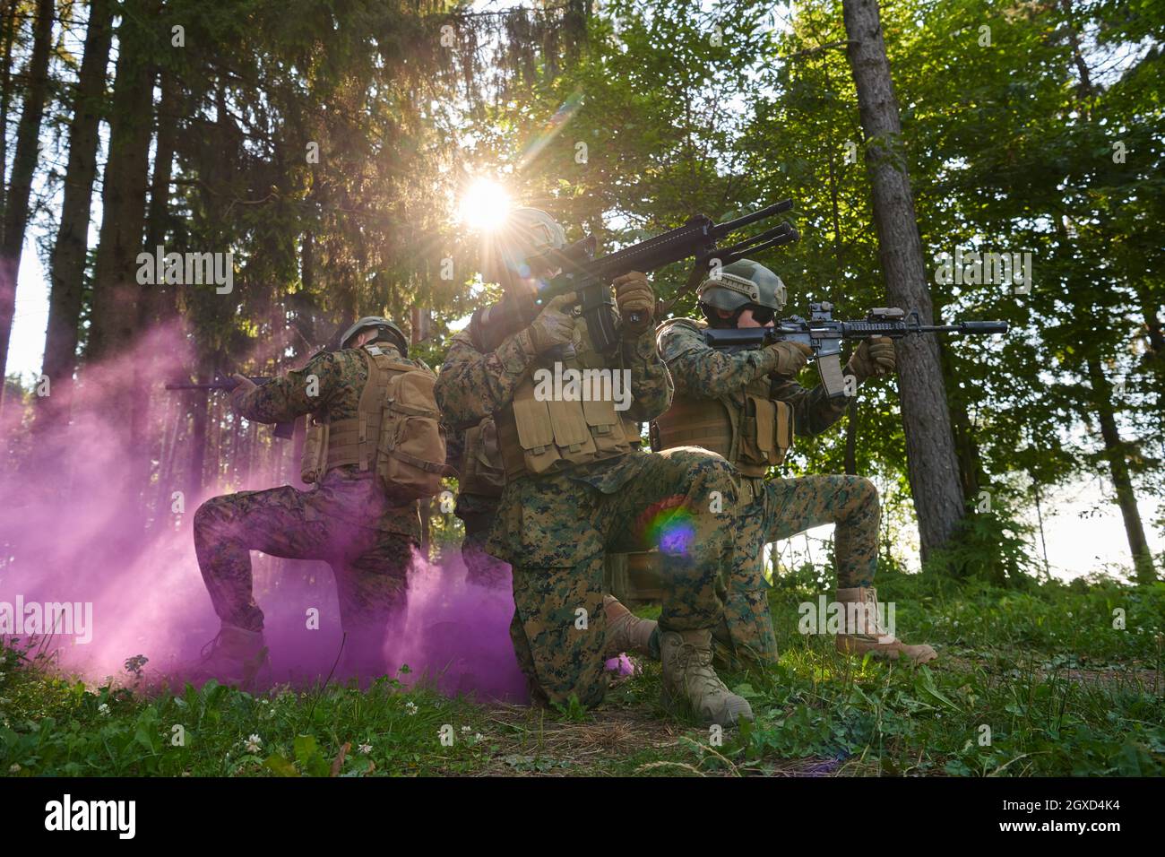 Soldier fighters standing together with guns. Group portrait of US army ...