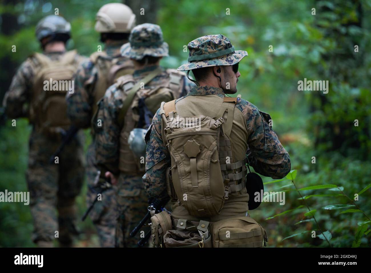 Modern warfare Soldiers Squad Running as Team in Battle Formation Stock ...