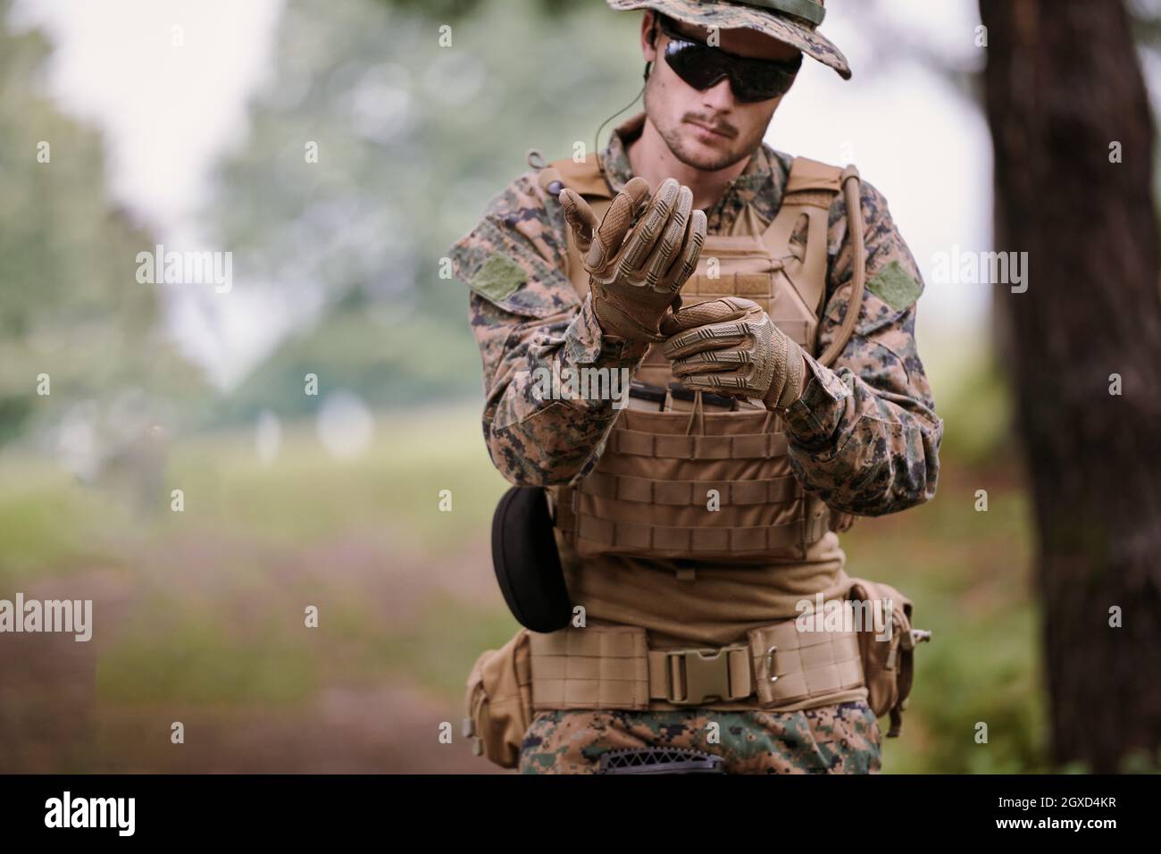 american marine corps special operations soldier preparing tactical and ...