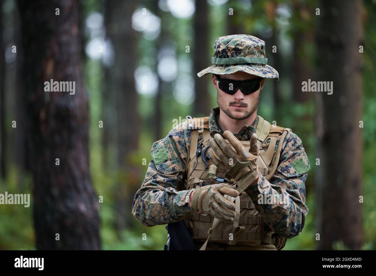 american marine corps special operations soldier preparing tactical and ...
